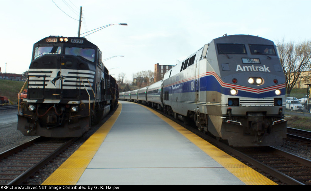 AMTK heritage unit 184 leaves Lynchburg. NS research train in former Amtrak storage track